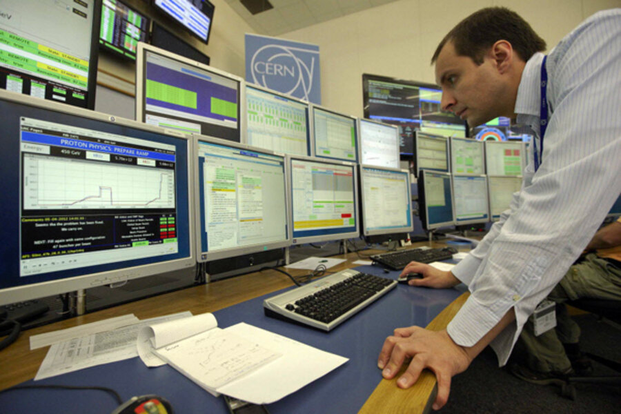 Large Hadron Collider atom smasher collides particles at record ...