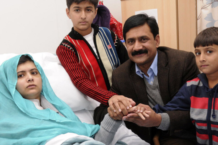 Shot Pakistani girl Malala recovering as father arrives in UK ...