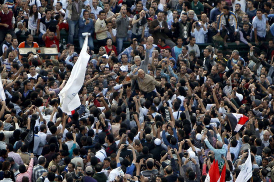New protests in Tahrir Square as Egypt's Morsi grants himself broad ...