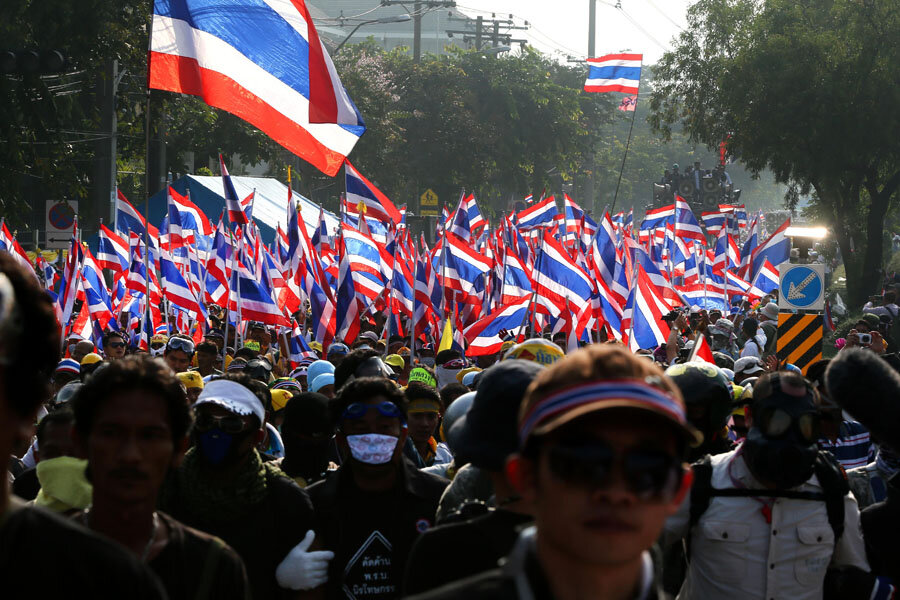 Thai protesters call for a 'people's revolution' as PM sets snap ...