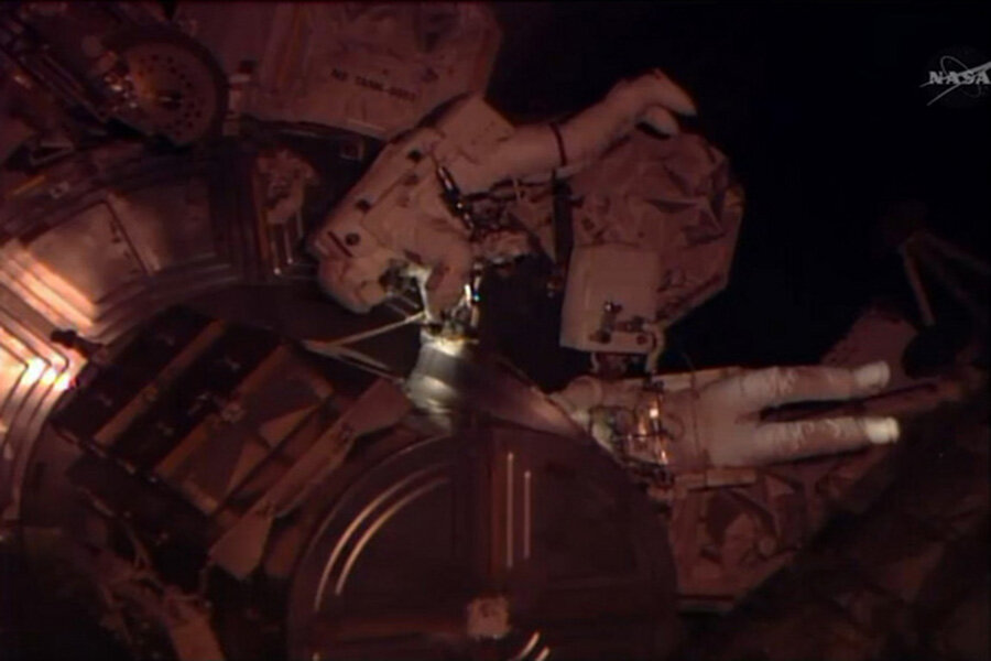 Space station astronauts step outside to replace dead computer ...