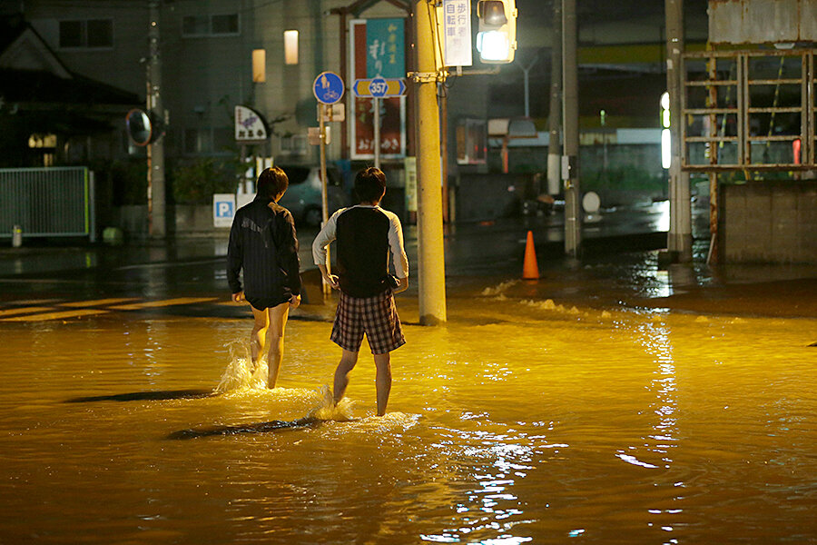 Flooding in Japan forces dozens of residents to rooftops, await rescue ...