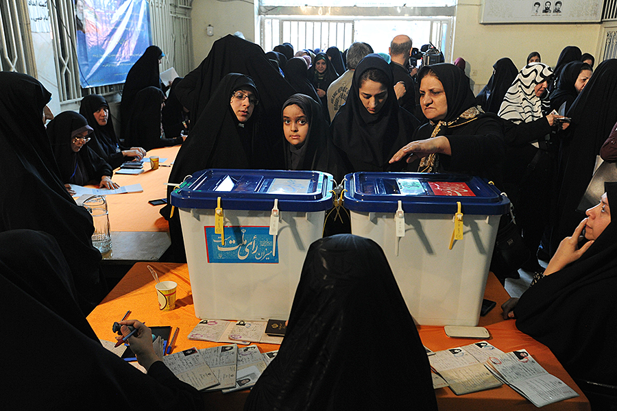Voting extended as Iranians crowd polling stations in crucial election ...