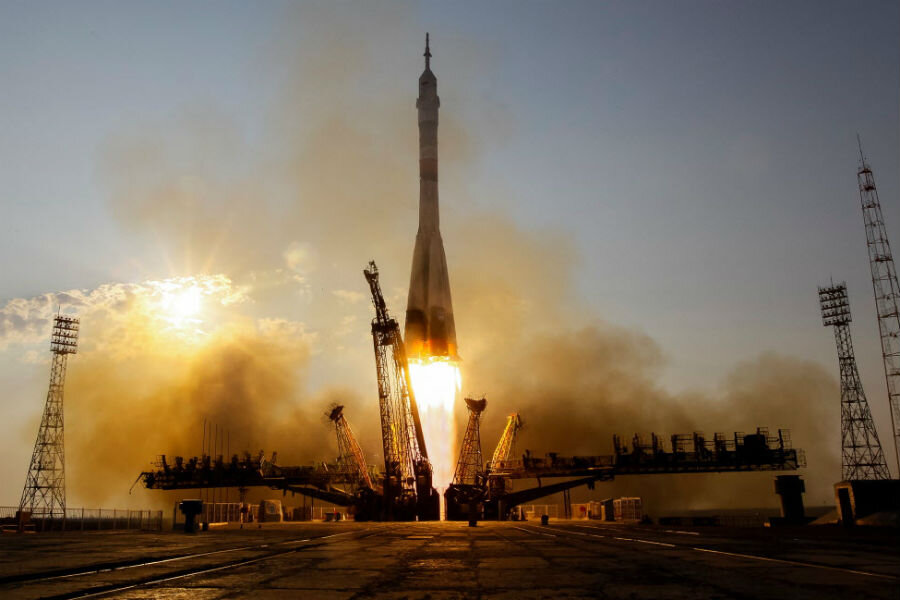 Russia's newly improved rocket launches international crew into space ...
