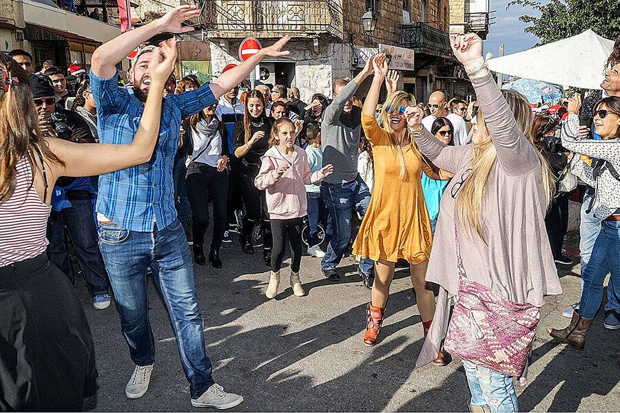 Haifa’s Happy Holidays: Three religions, one giant block party ...