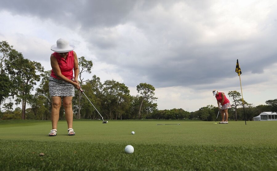 Still swinging: Golfing offers fresh air and social distance ...