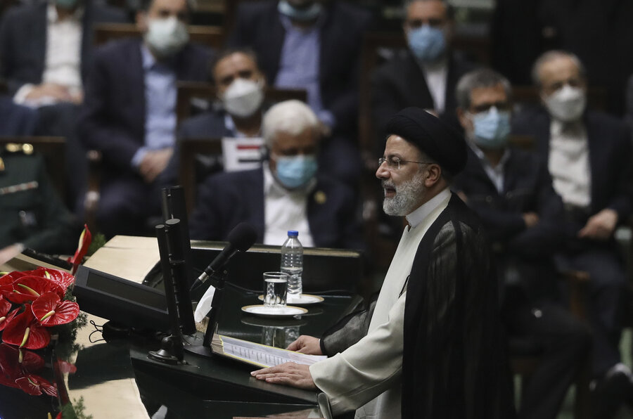 Continuing hostility to West, Iran swears in hard-line president ...