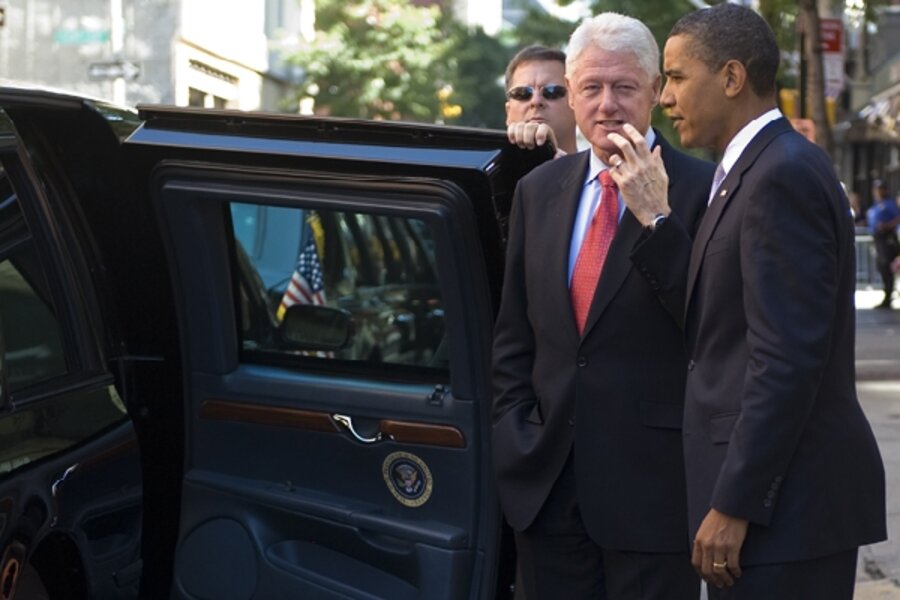 Obama and Bill Clinton eat food (fish and pasta -- not McRibs ...