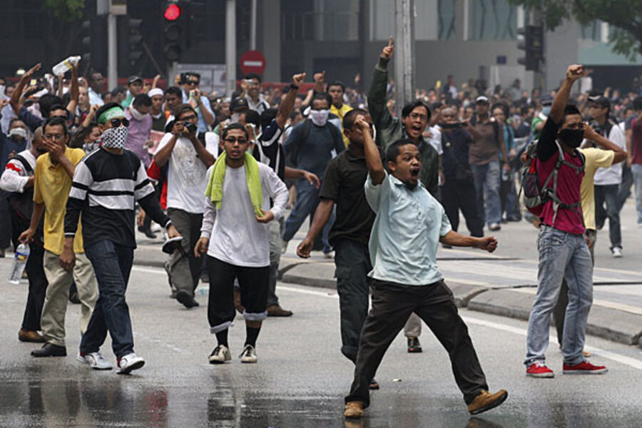 After mass arrests, authorities shrug off rare Malaysia protests ...